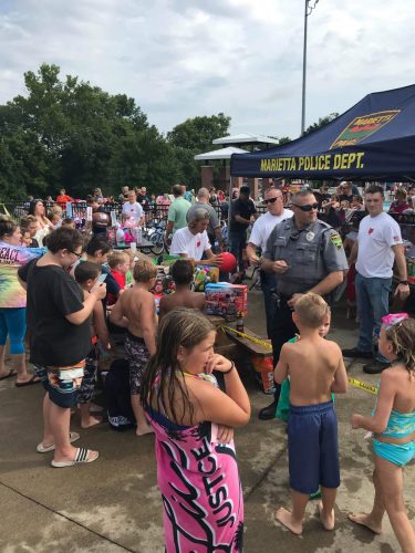 Youth, officers enjoy police pool party | News, Sports, Jobs - Marietta ...